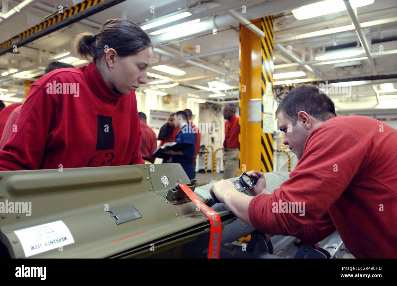 US Navy Weapons assembly aboard USS Harry S. Truman Stock Photo - Alamy
