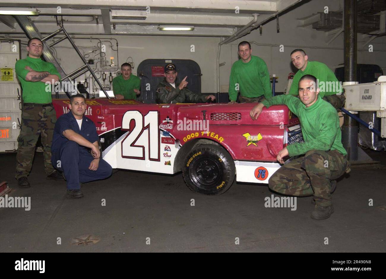 US Navy A tow tractor painted as a replica of professional race driver ...