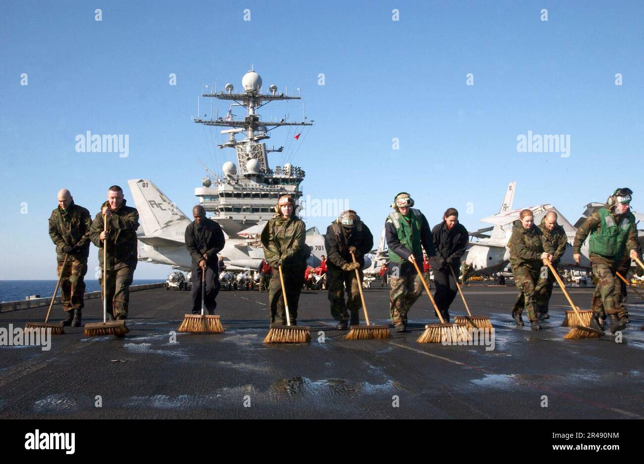 US Navy Flight Deck Personnel aboard the aircraft carrier USS Harry S ...