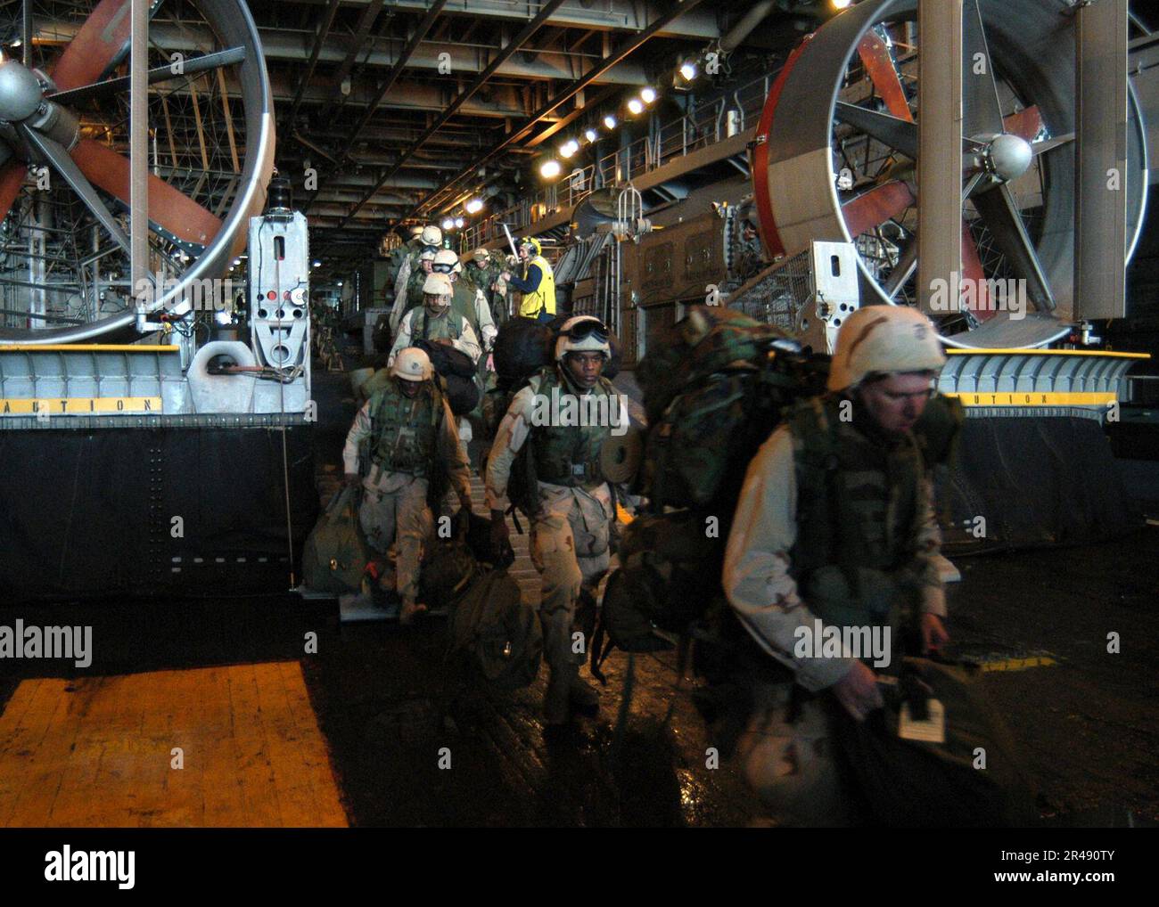 US Navy In the well deck aboard the amphibious assault ship USS ...