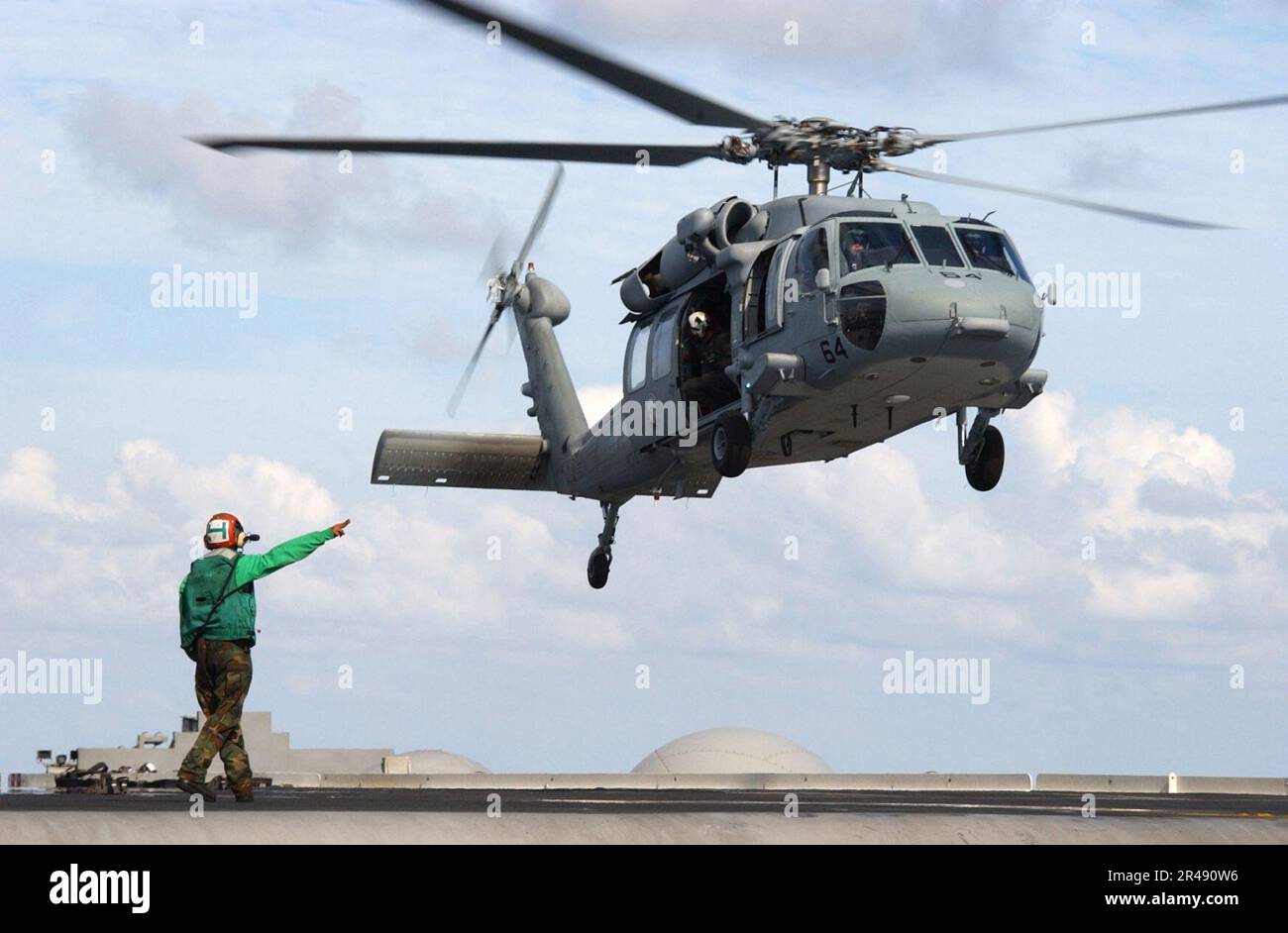 US Navy A Landing Signalman Enlisted (LSE) assigned to the Chargers of ...