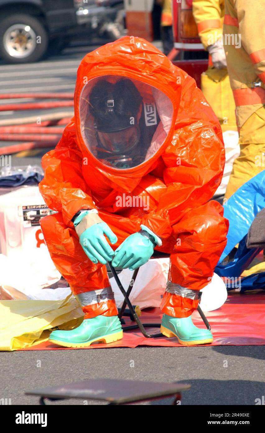 US Navy Emergency Response Team (ERT) members practice going through ...
