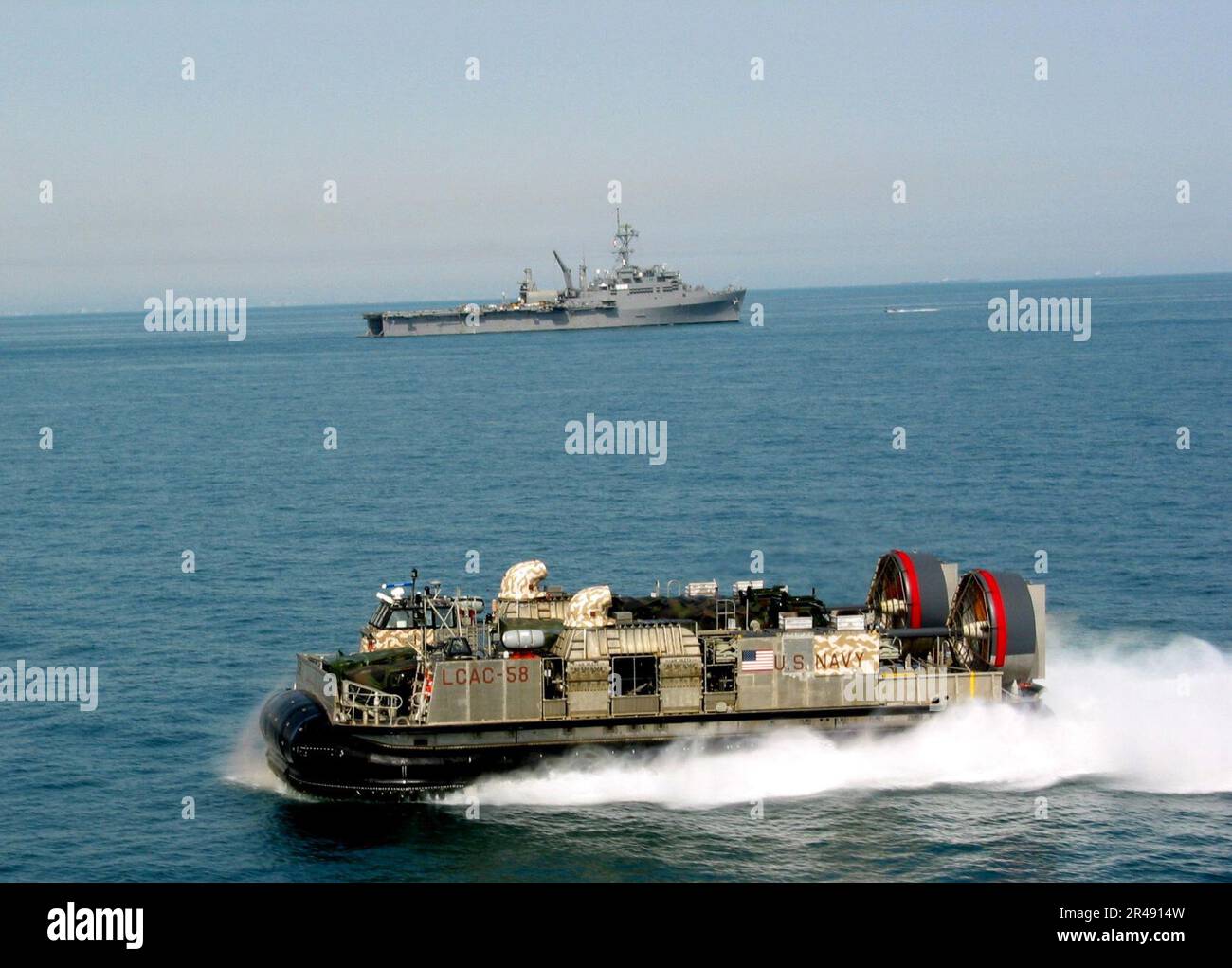 US Navy A Landing Craft, Air Cushion (LCAC) closes-in to its return ...