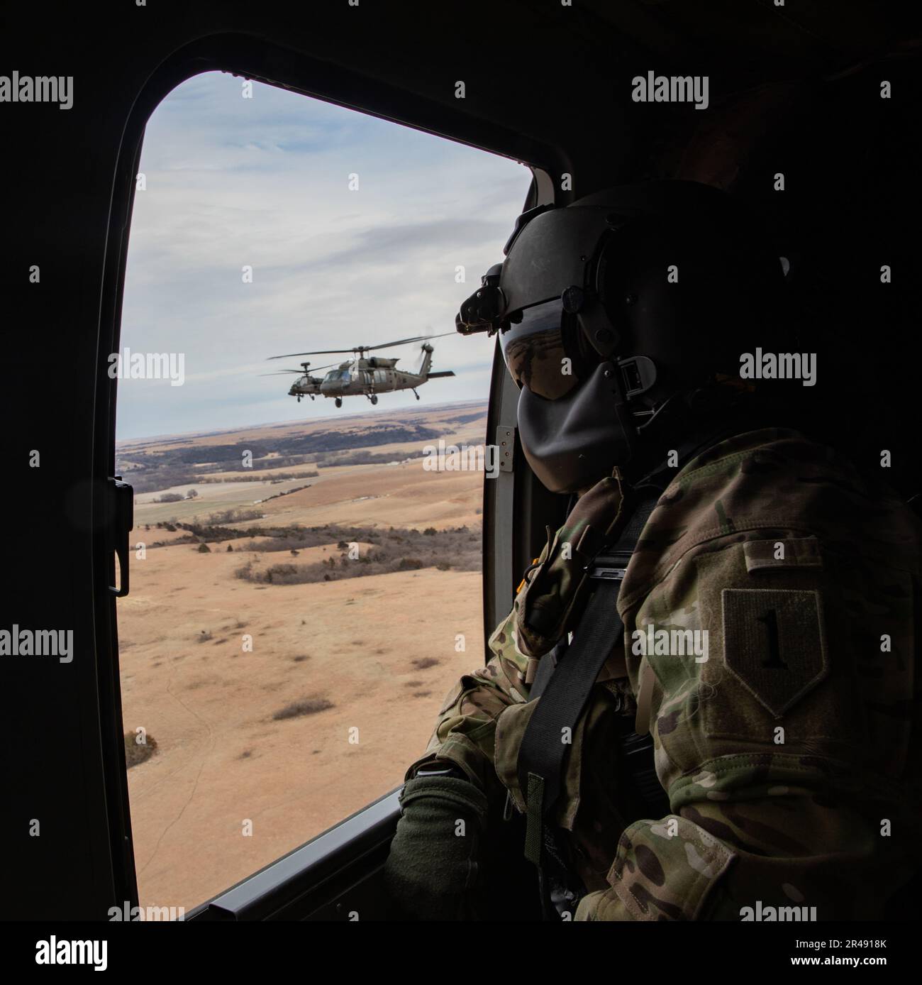 U.S. Army Sgt. First Class Ashley Jacobs, a Black Hawk crew chief ...