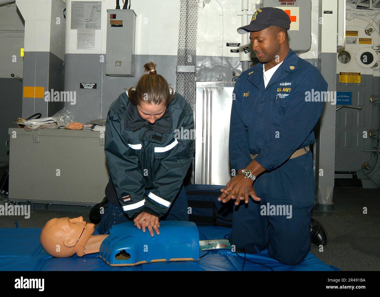 US Navy how to properly apply Cardiac Pulmonary Resuscitation Stock ...