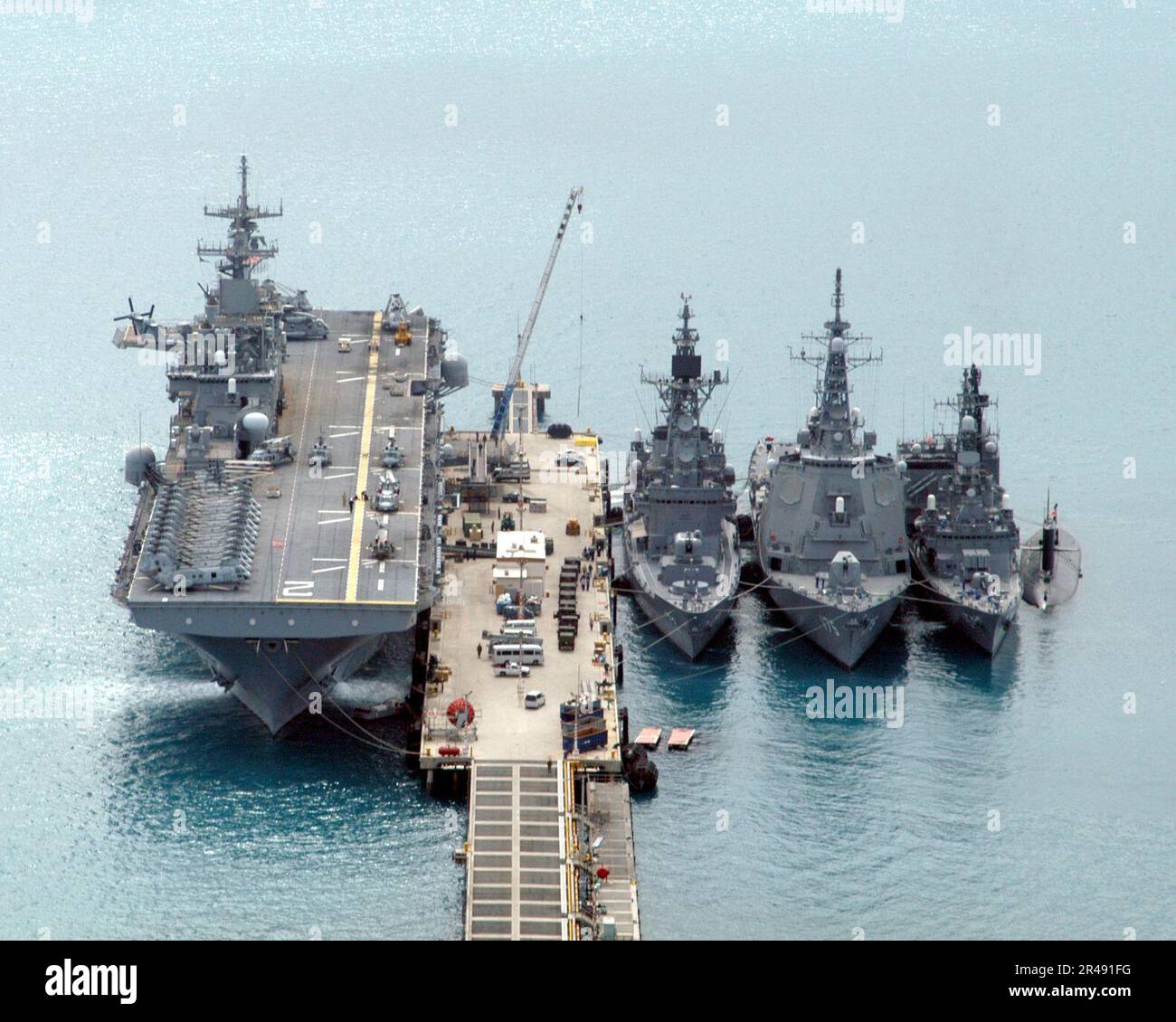 US Navy A busy day for the White Beach Port Facility in Okinawa, Japan ...