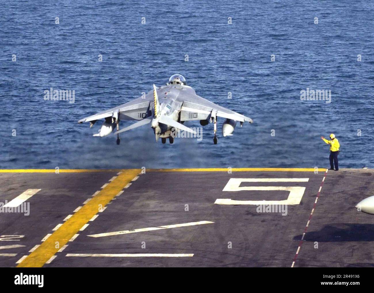 US Navy An AV-8 Harrier launches from the fight deck of the amphibious ...