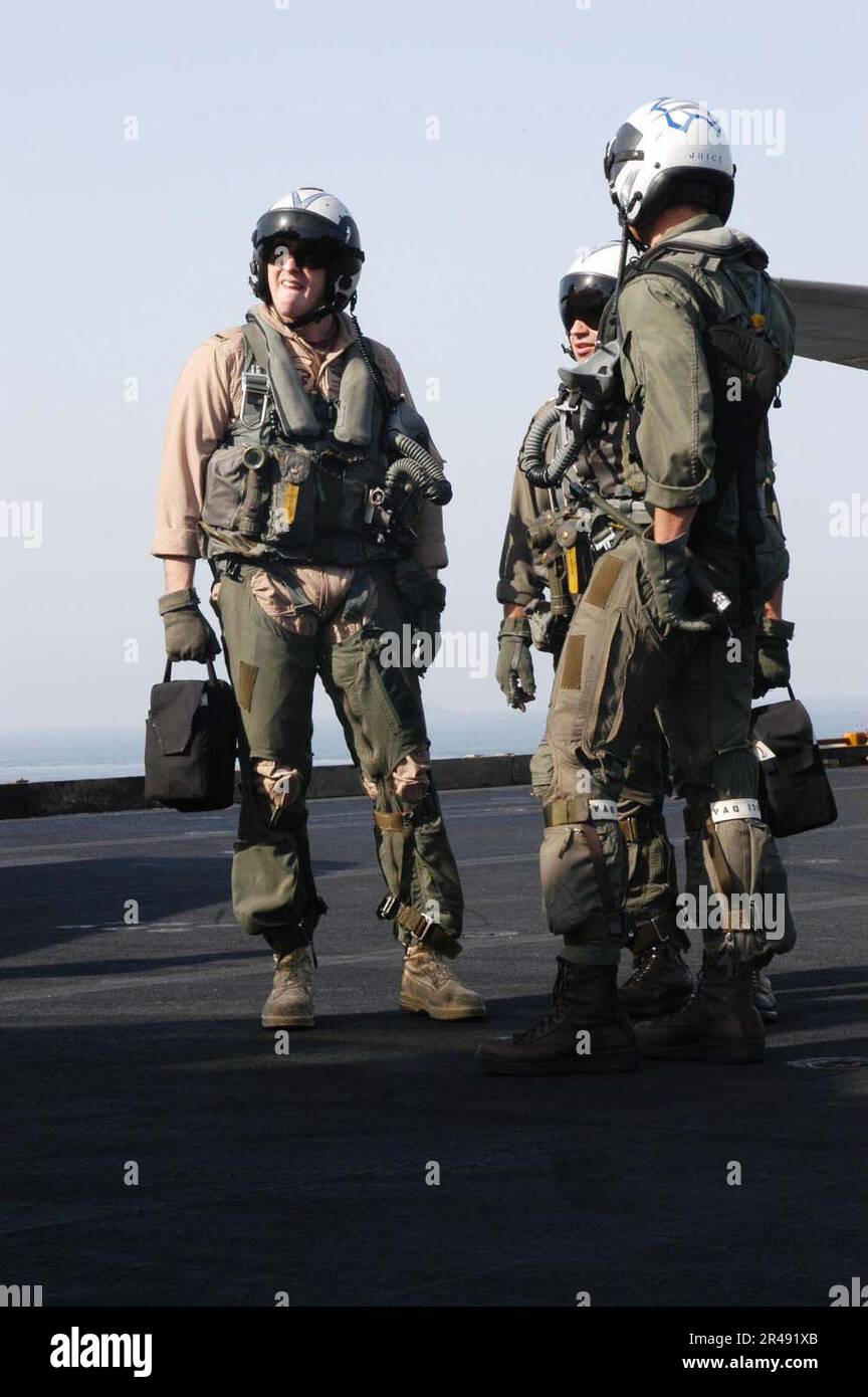 US Navy Naval air crew personnel on flight deck aboard USS Abraham ...