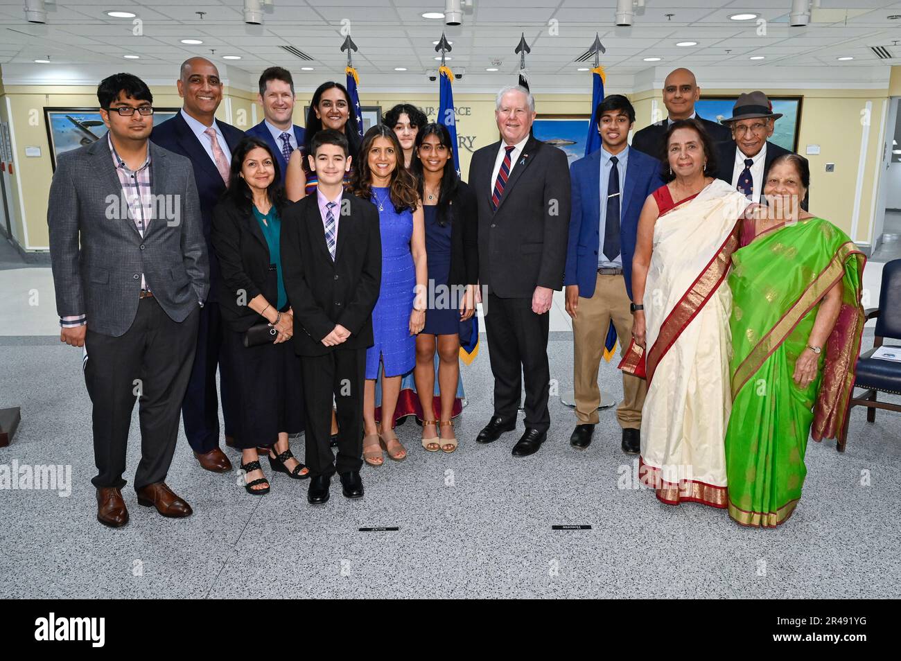 Dr. Ravi Chaudhary, second from left, assistant secretary of the Air ...