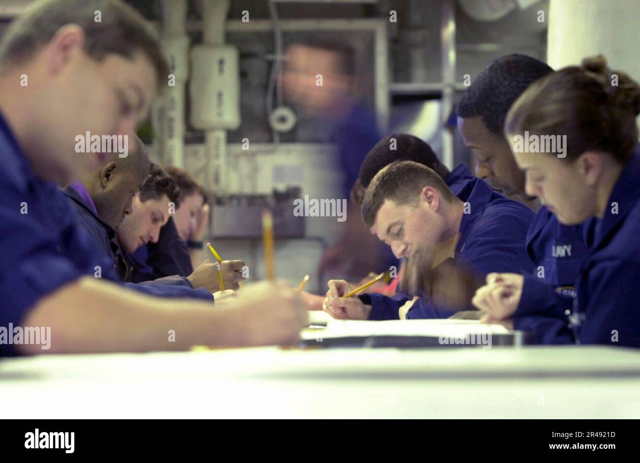 US Navy Second Class Petty Officers aboard the aircraft carrier USS ...