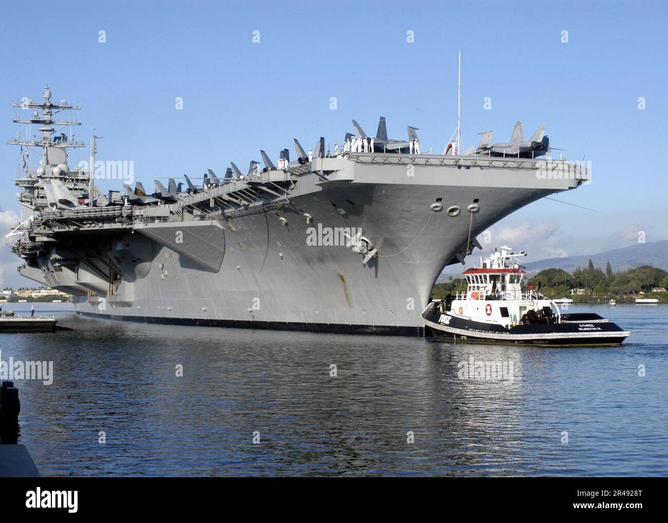 US Navy USS Nimitz (CVN 68), makes a port visit in Pearl Harbor before ...
