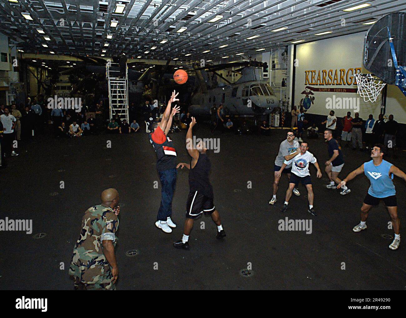 US Navy Sailors and Marines participate in a 3 on 3 basketball ...