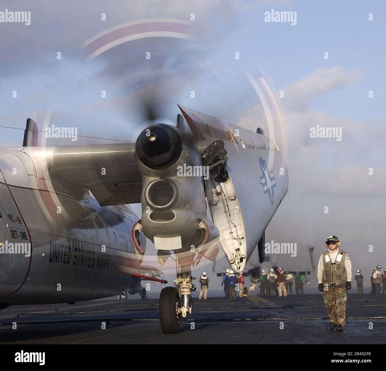 US Navy A C-2A Greyhound moves across the flight deck of USS Harry S ...