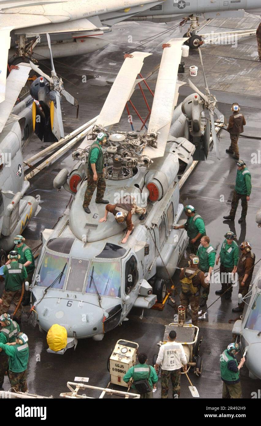 US Navy Sailors assigned to the Chargers of Helicopter Antisubmarine ...