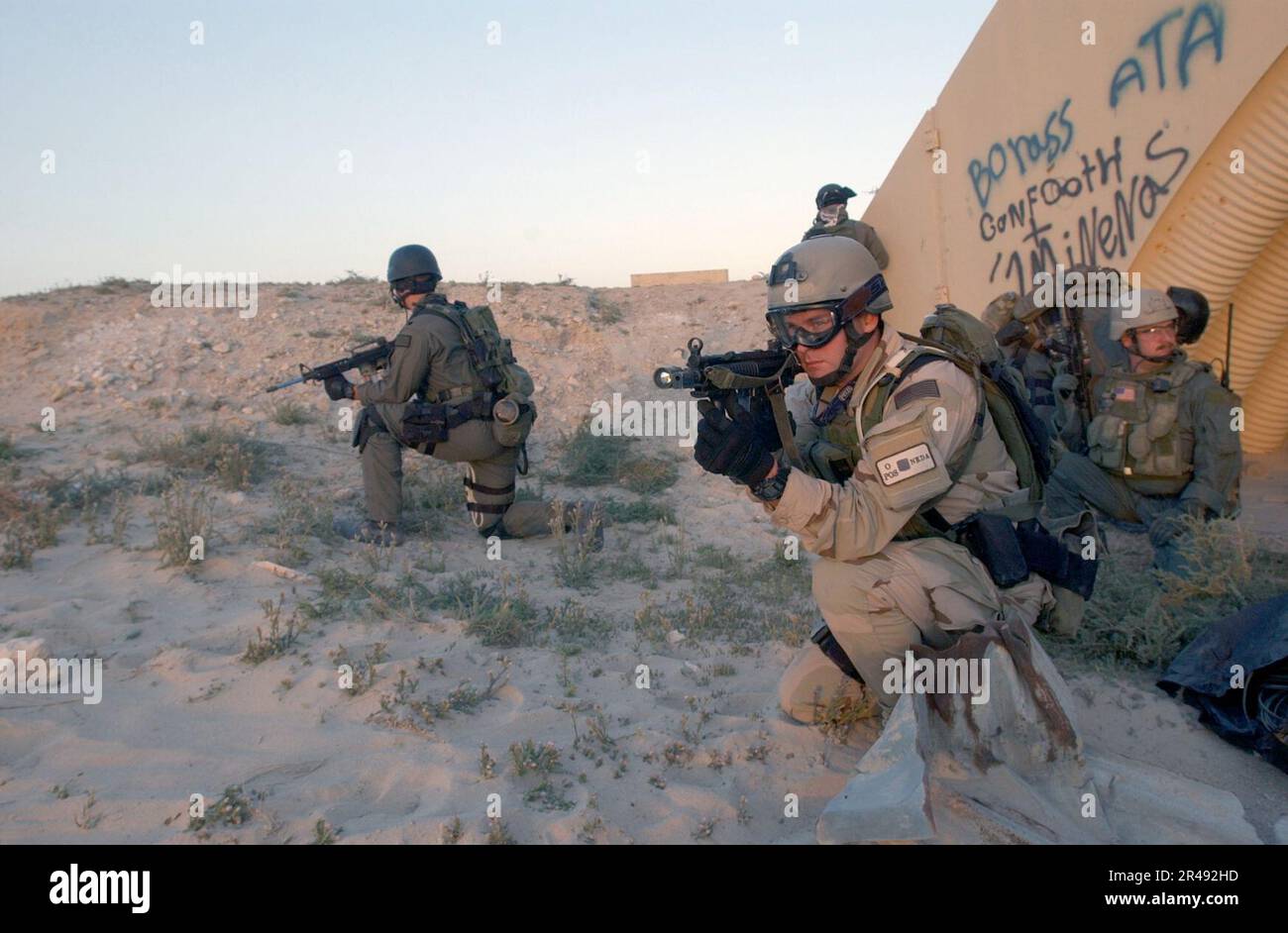 US Navy Naval Special Warfare team members conduct a training operation ...