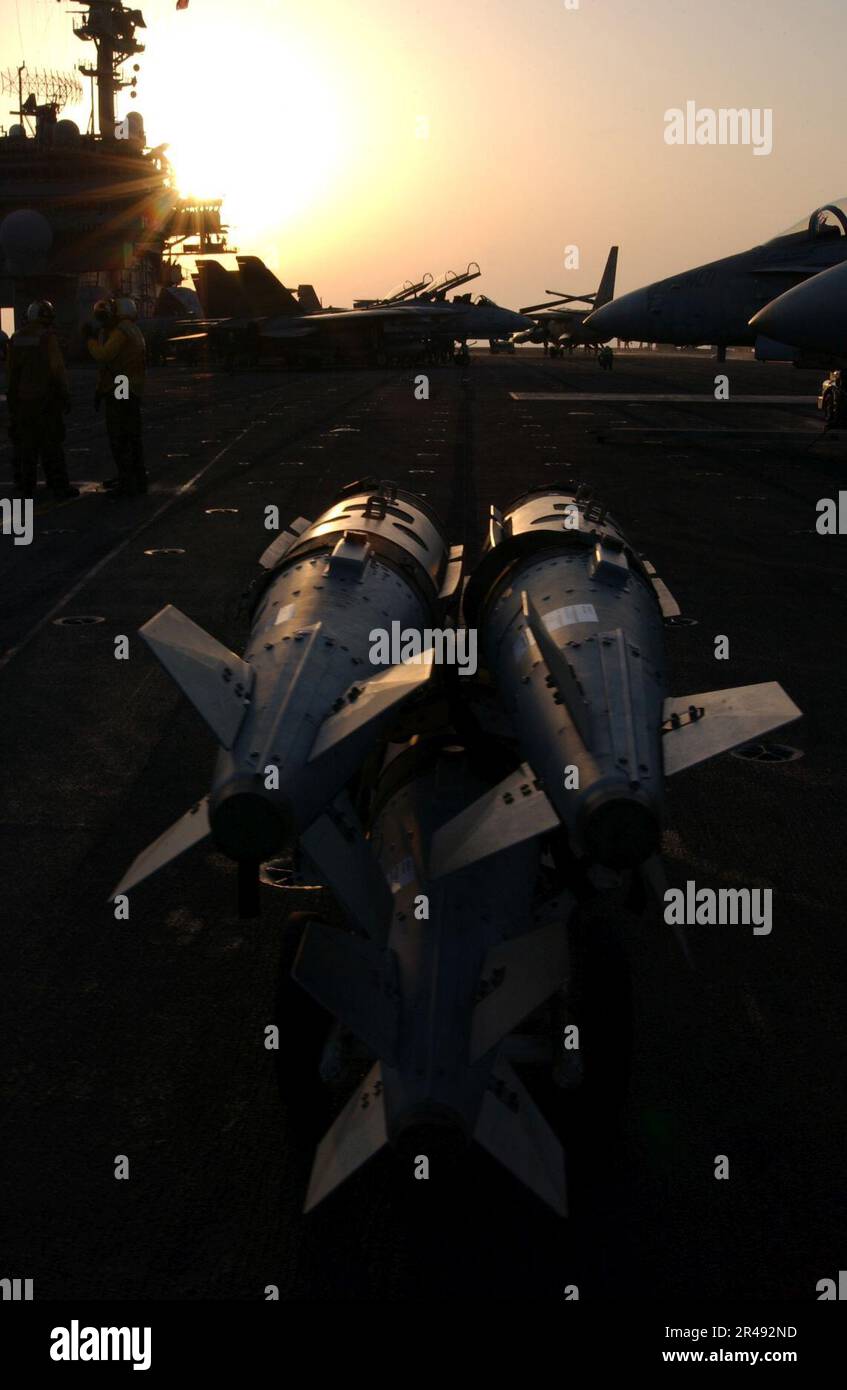 US Navy Two GBU-31 Joint Defense Attack Munitions (JDAM) are positioned ...