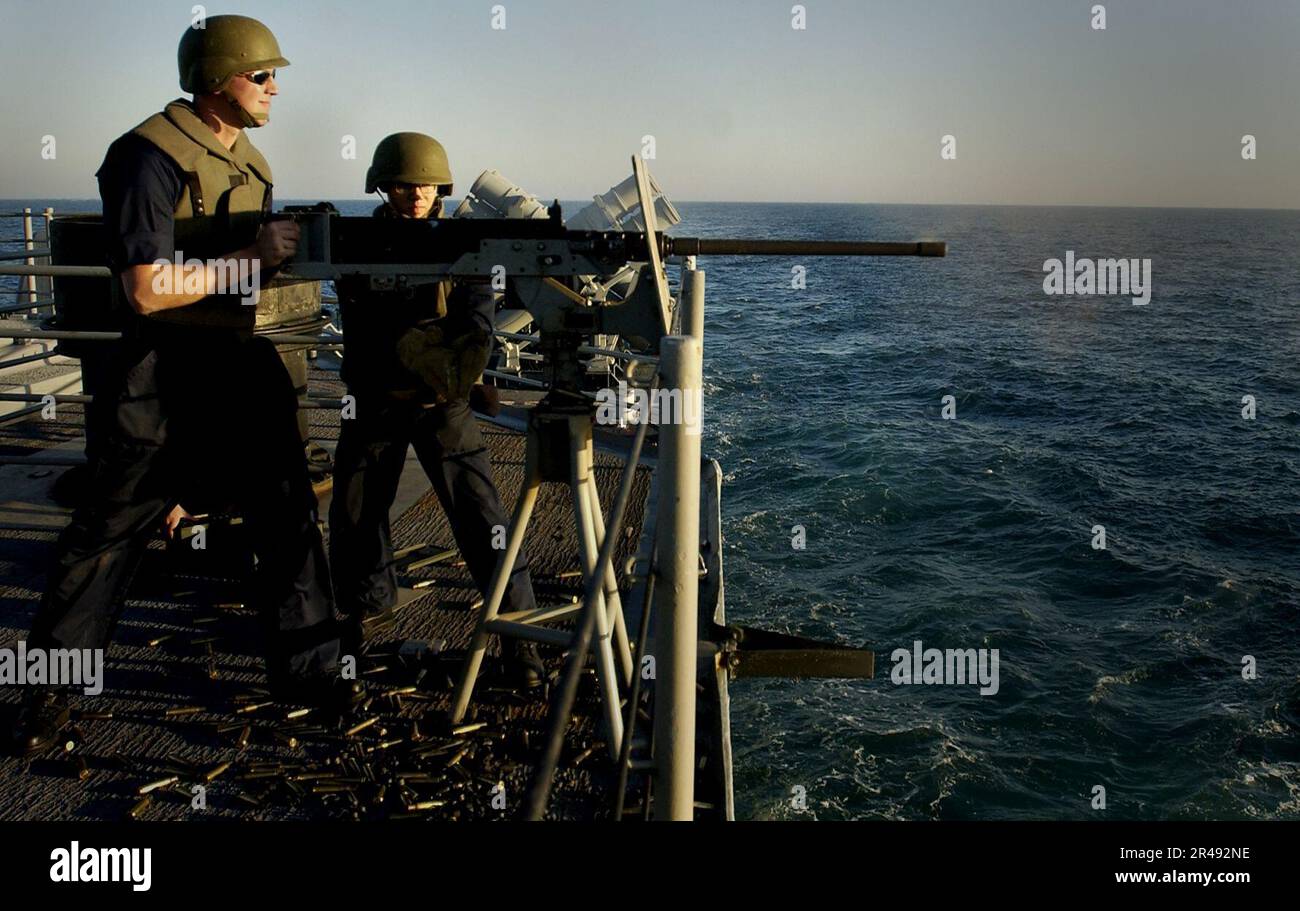 US Navy Sailors aboard the guided missile cruiser USS Shiloh (CG 67 ...