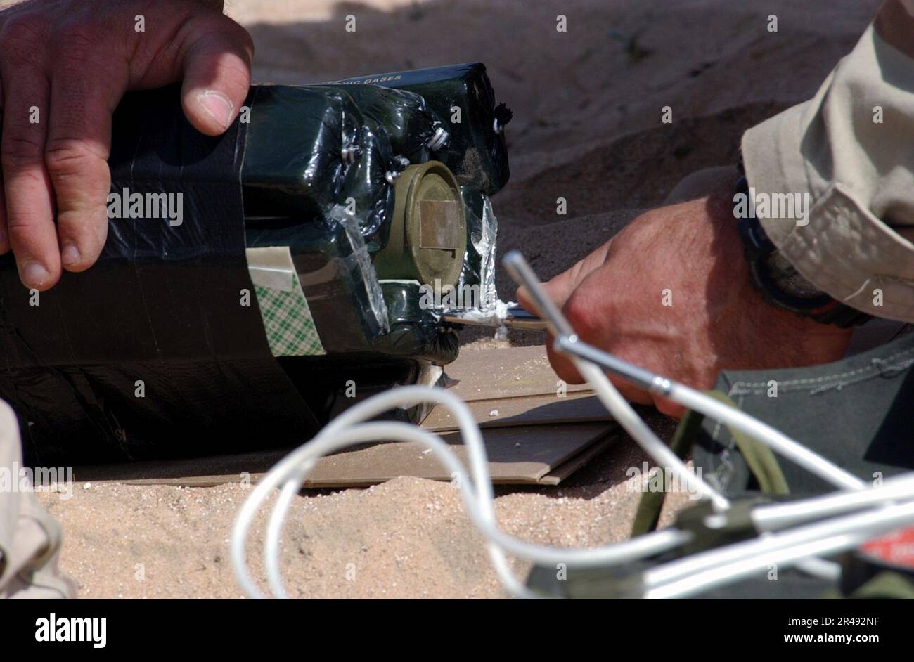 US Navy Members of Underwater Construction Team Two (UCT-2) prepares ...