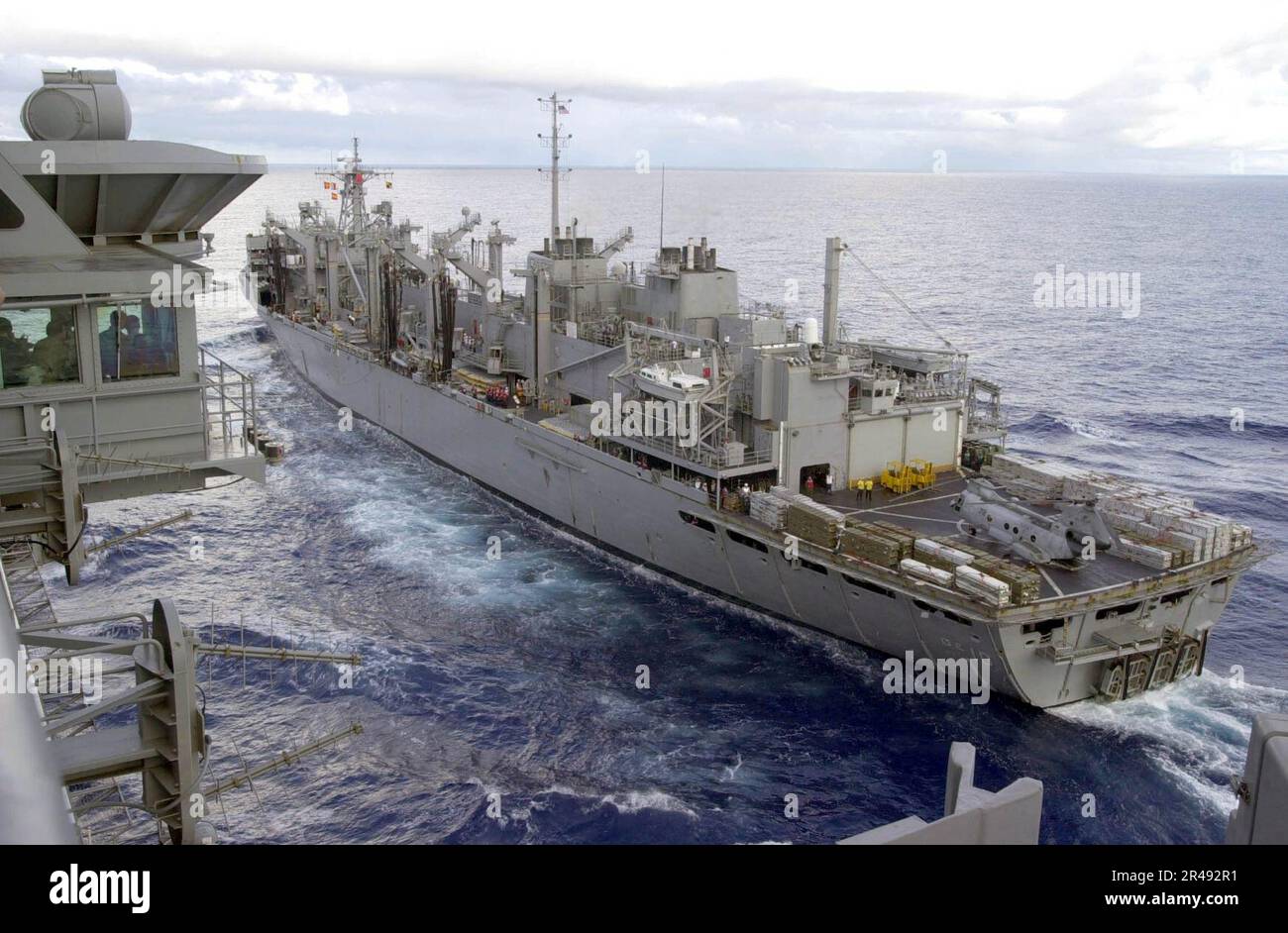US Navy The aircraft carrier USS Nimitz (CVN 68) pulls alongside fast ...