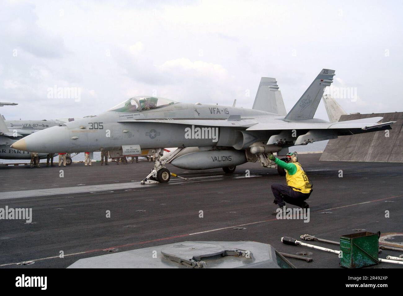 US Navy An Aviation Boatswain's Mate gives a 'thumbs up' as an F-A-18C ...