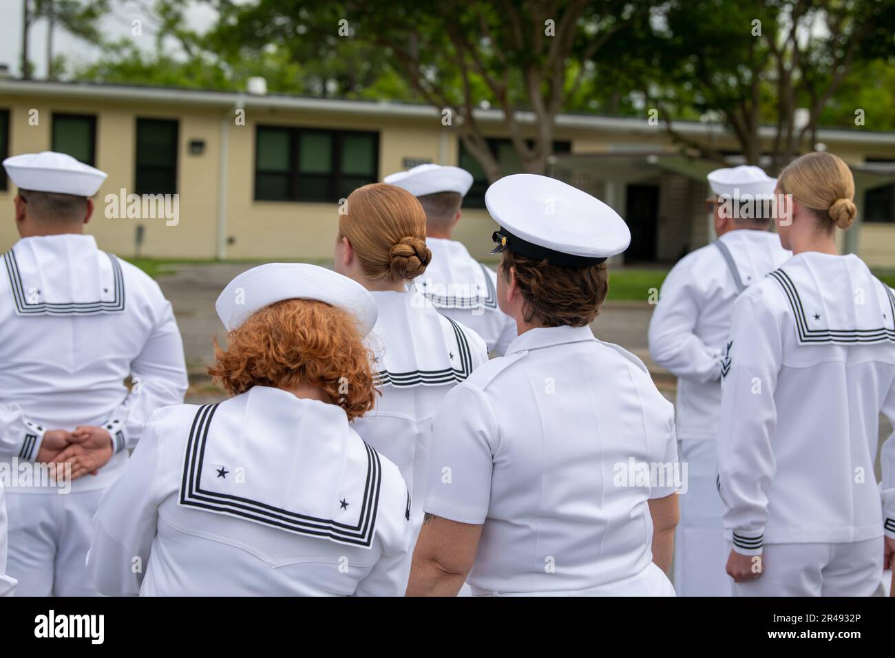 Command leadership conducts a dress whites uniform inspection, Apr. 07 ...