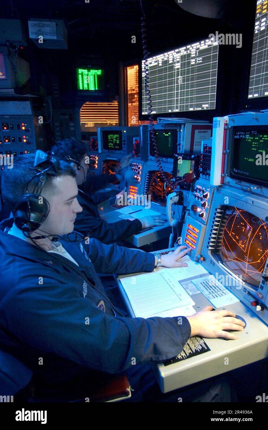 US Navy A Sailor aboard USS Harry S. Truman (CVN 75) searches for ...