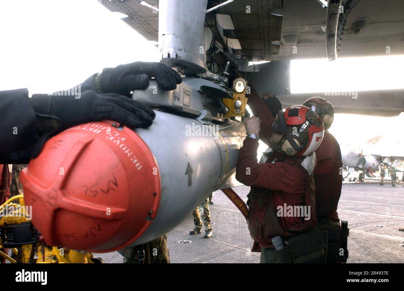 US Navy Aviation Ordnanceman prepare an S-3B Viking for it's next ...