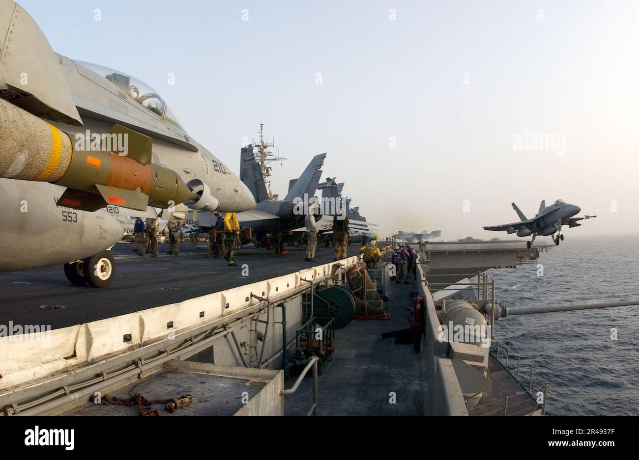 US Navy An F-A-18C Hornet, loaded with a 500-pound GBU-12 laser-guided ...