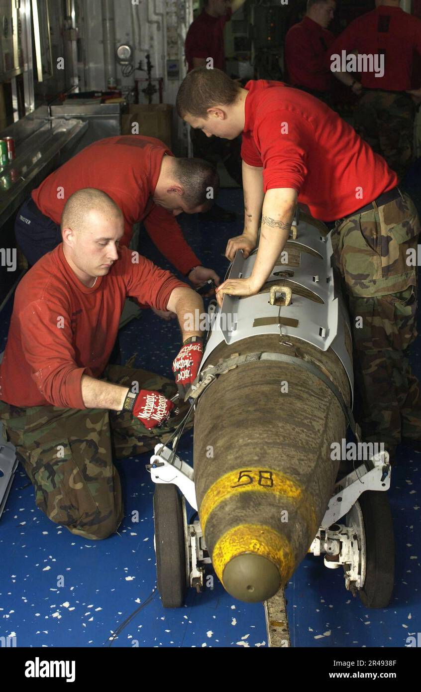 US Navy Aviation Ordnancemen assemble Joint Direct Attack Munitions ...