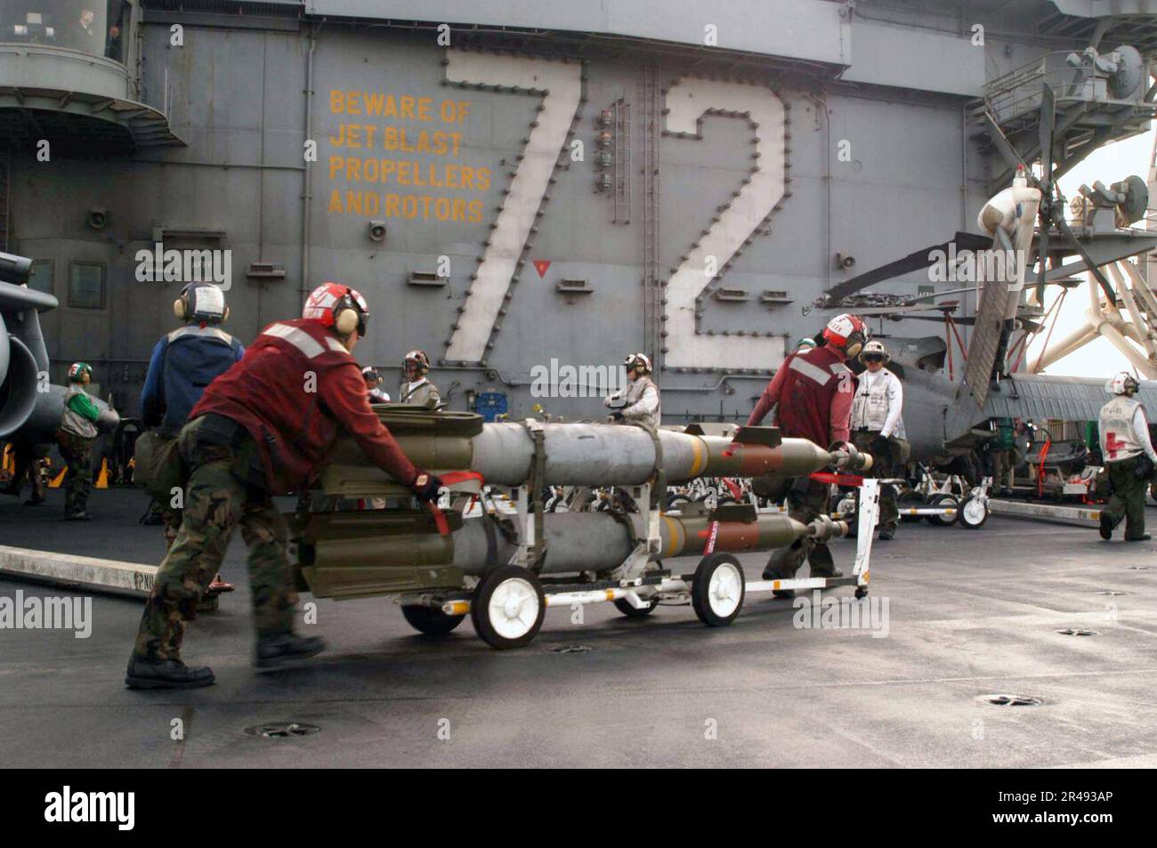 US Navy Aviation Ordnancemen assigned to the ''Stingers'' of Strike ...