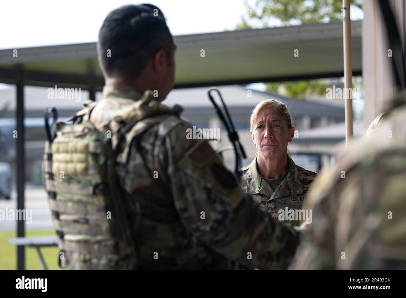 Col. Allison Black, 1st Special Operations Wing Commander, listens as a ...