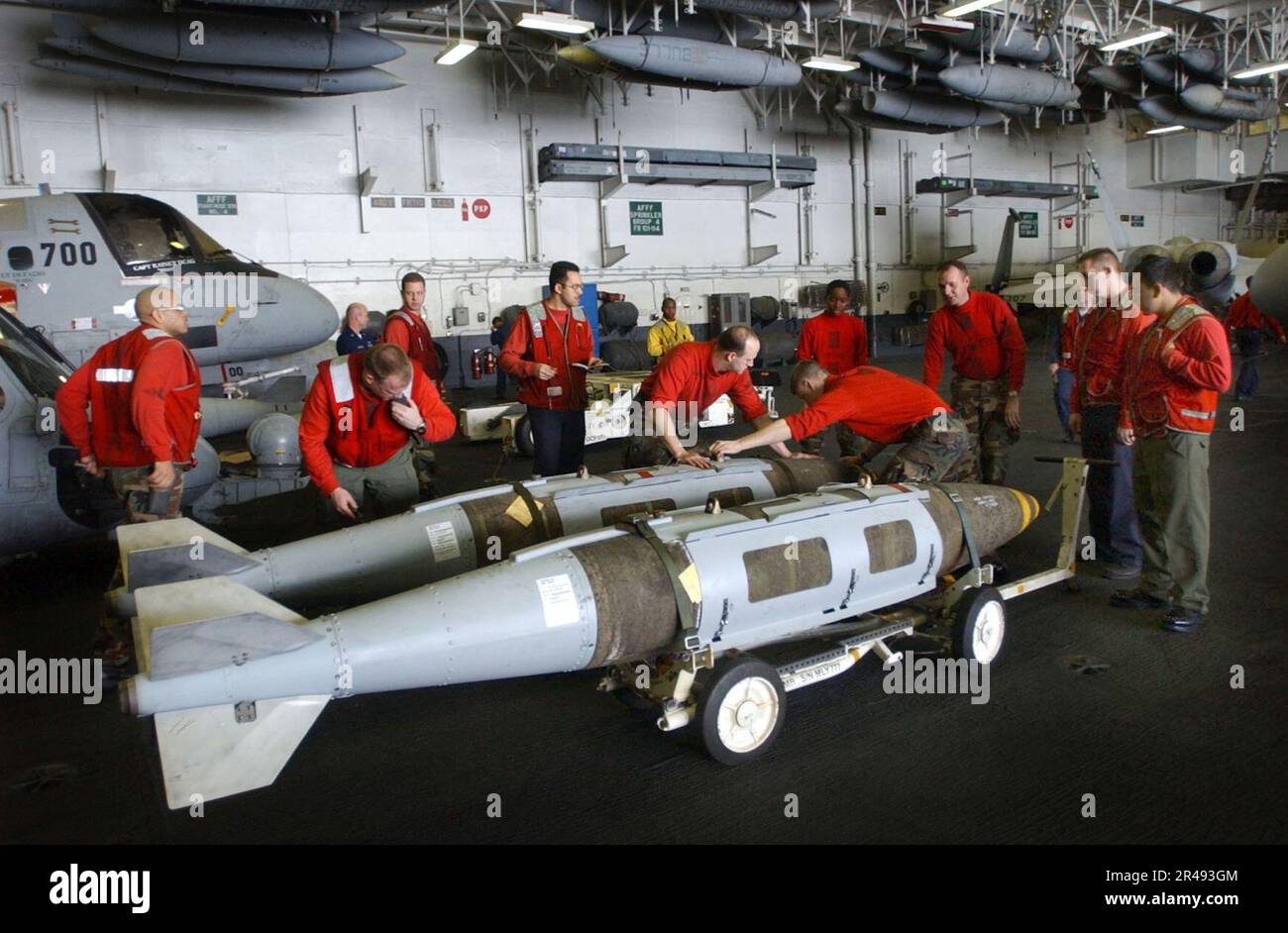 US Navy Aviation Ordnancemen move 2,000-pound Joint Directional Attack ...