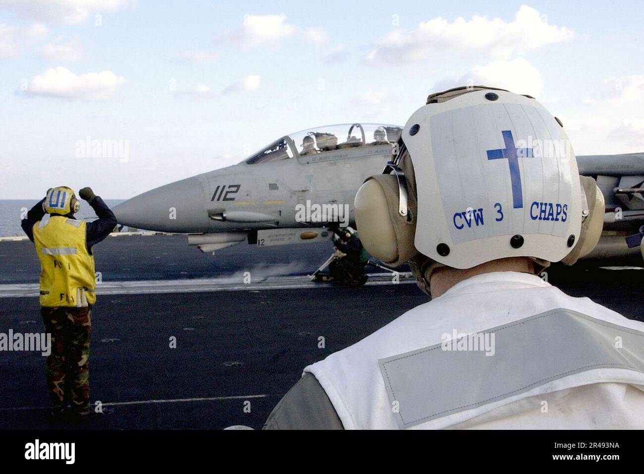 US Navy Carrier Airwing Three (CVW-3) Chaplain stands behind the 'foul ...