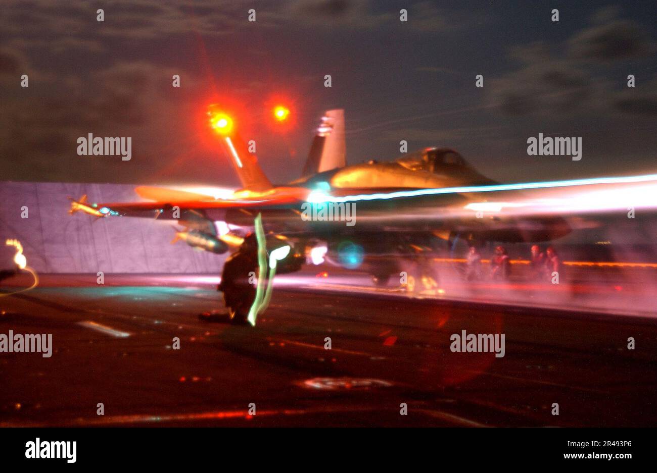 US Navy An F-A-18 Hornet launches from one of four steam driven ...