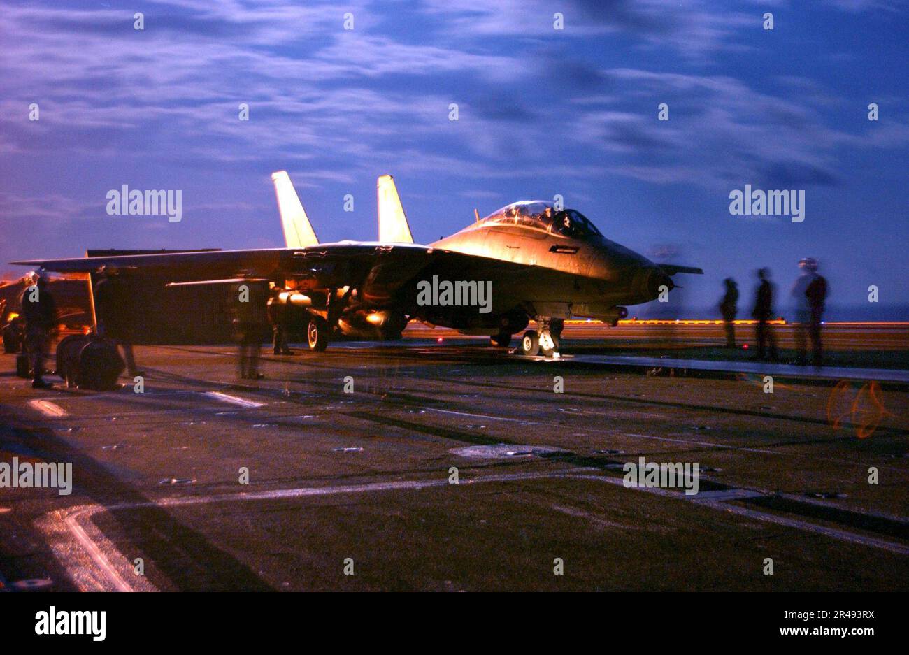 US Navy An F-14B Tomcat launches from one of four steam driven ...