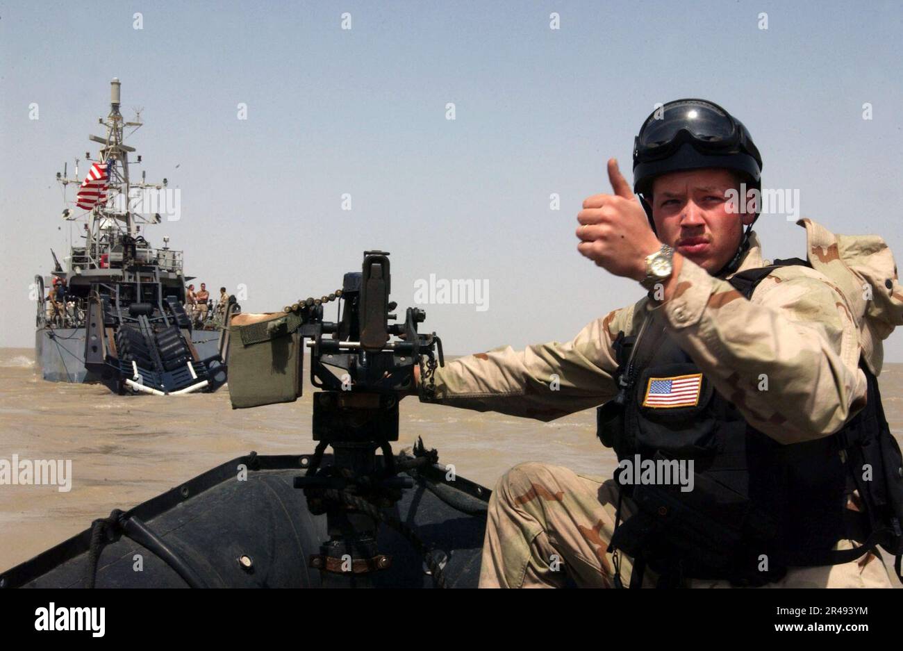 US Navy A Rigid Hull Inflatable Boat (RHIB) clears the Cyclone Class ...
