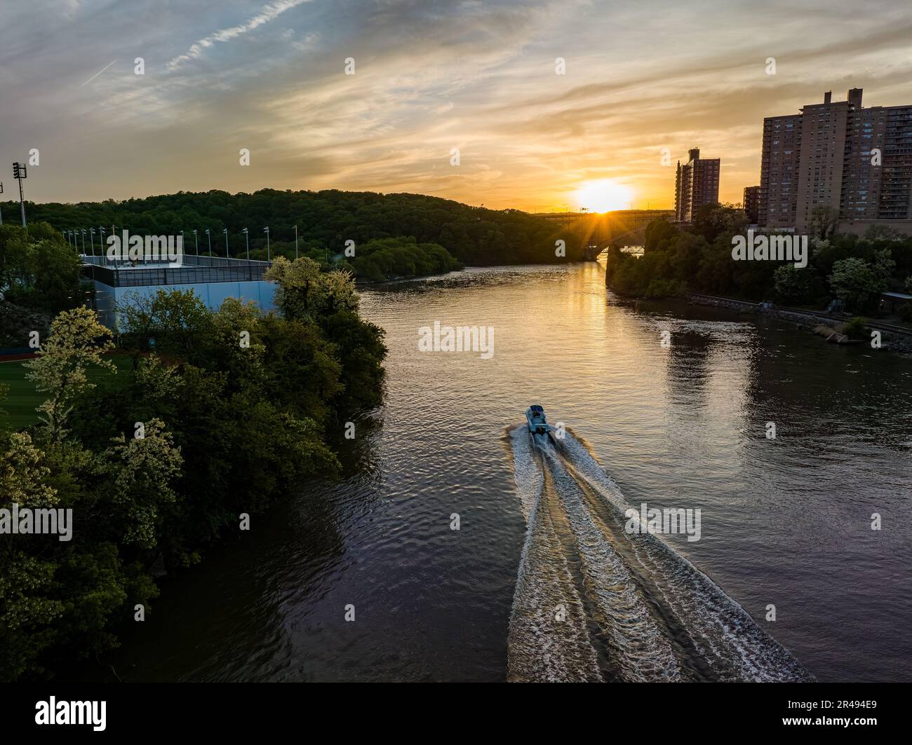 An aerial view of a boat cruising on the Spuyten Duyvil Creek by Inward ...