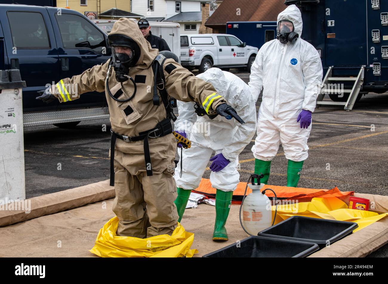 Members of the 52nd Civil Support Team ready themselves to enter an ...