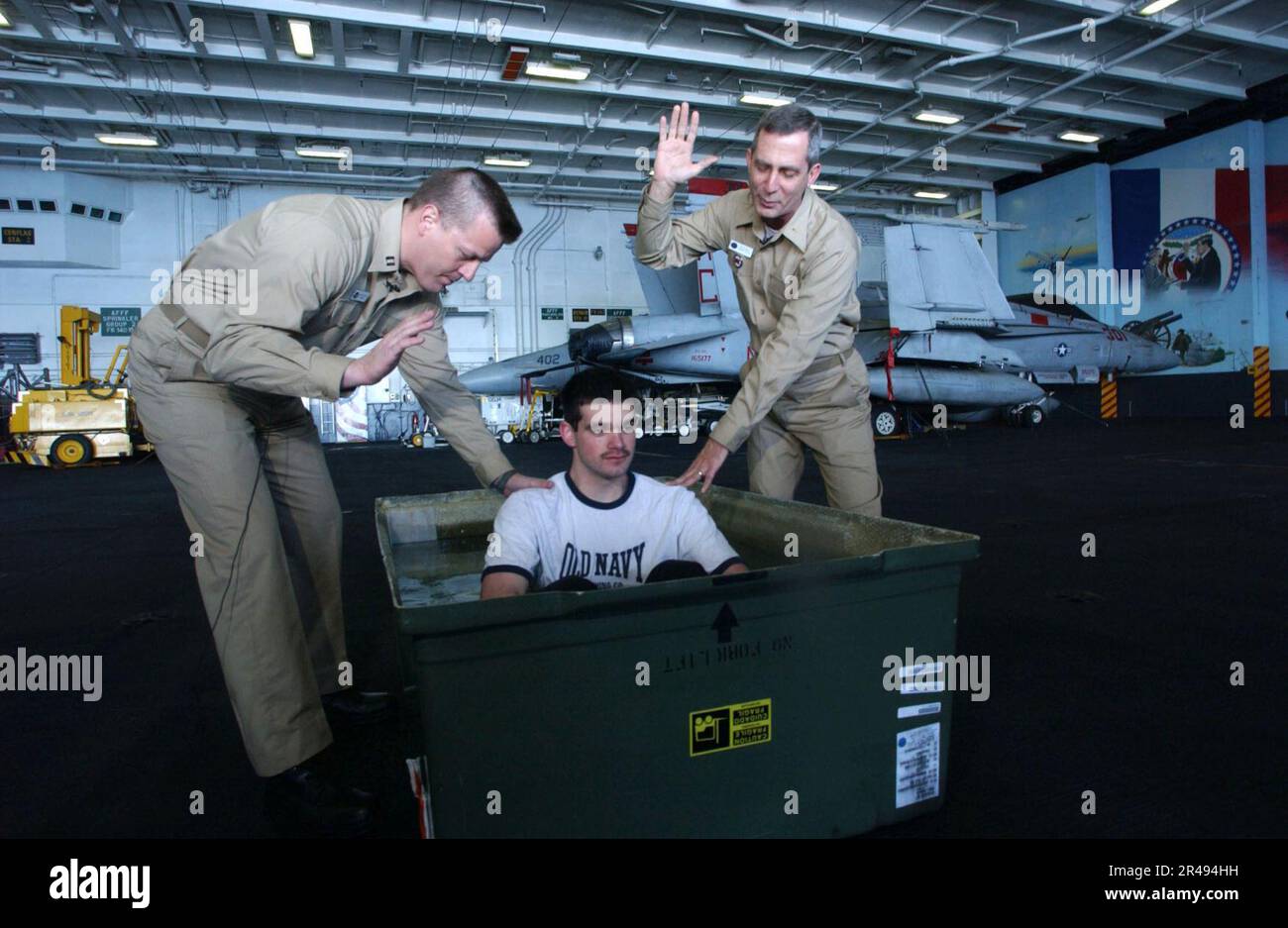 US Navy Chaplains baptize a Sailor in a Joint Directional Attack ...