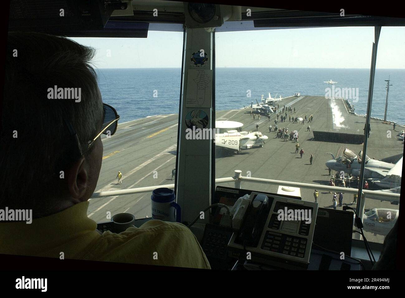 US Navy The Air Boss observes flight operations from primary flight ...