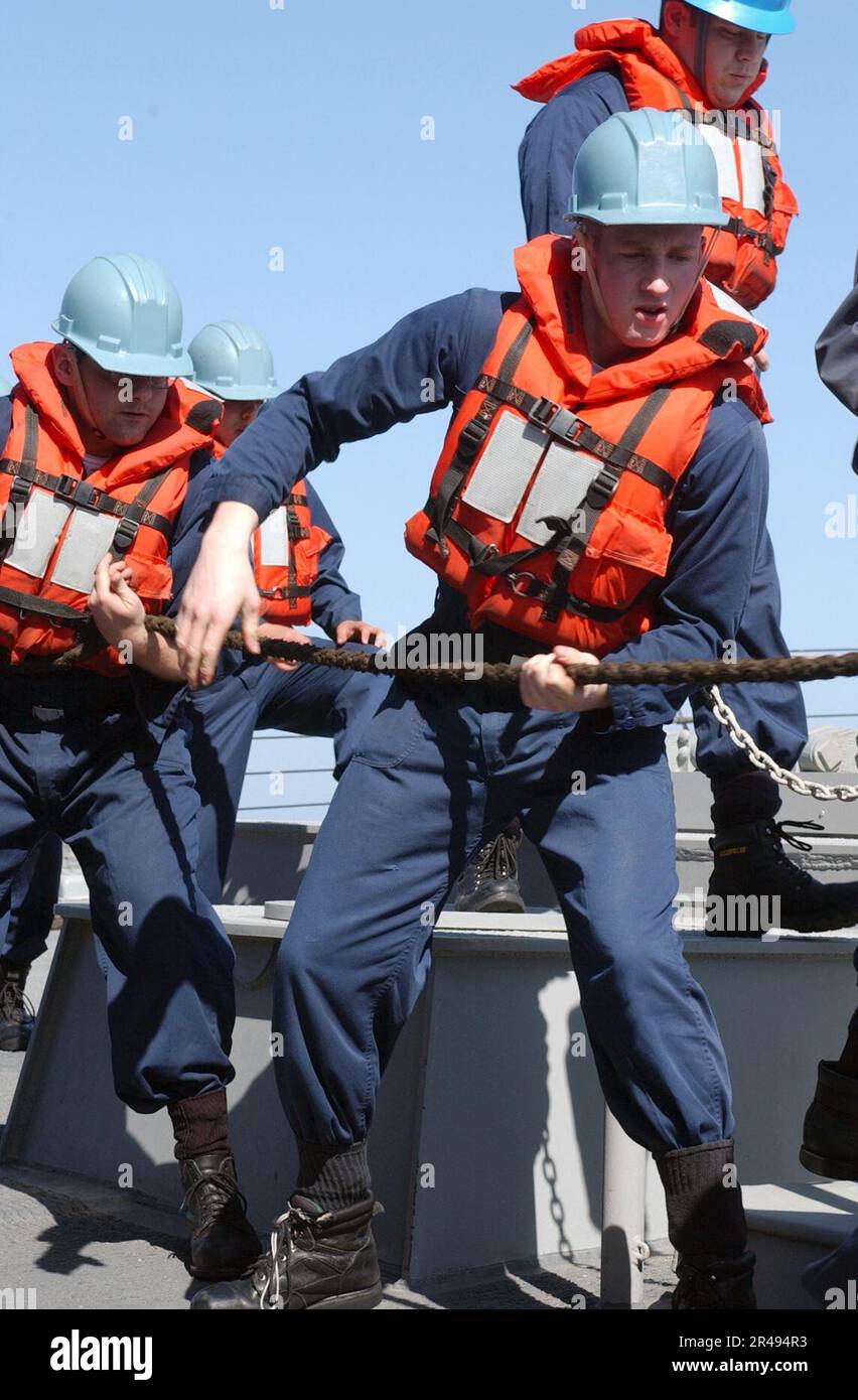 US Navy Deck Department personnel from the Arleigh Burke-class ...