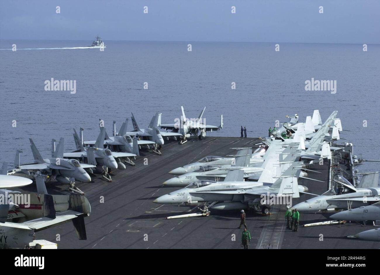 US Navy Aircraft from Carrier Air Wing Eleven (CVW-11) are chocked and ...