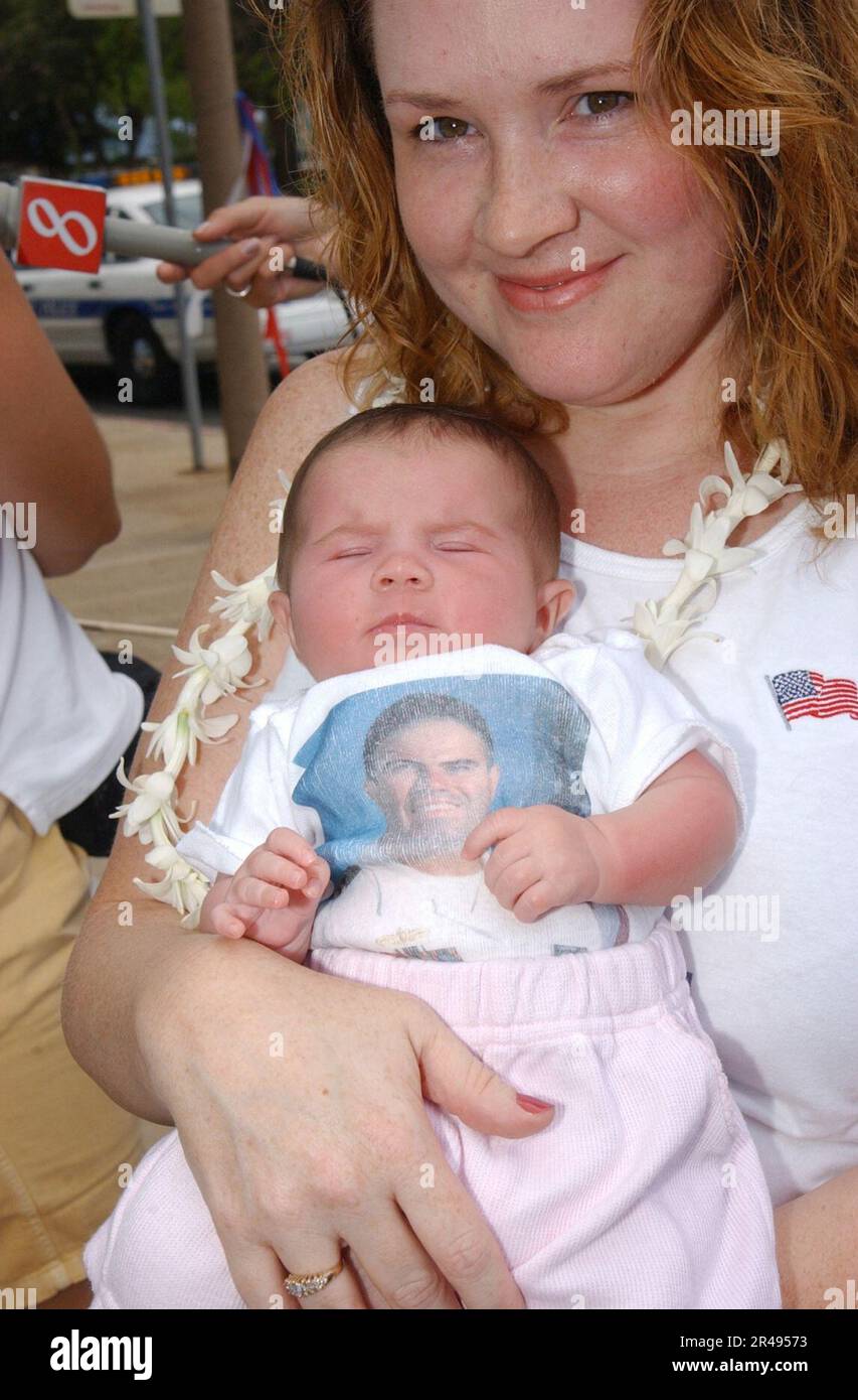 US Navy A Navy spouse holds her two-month old baby girl at a Rally For ...