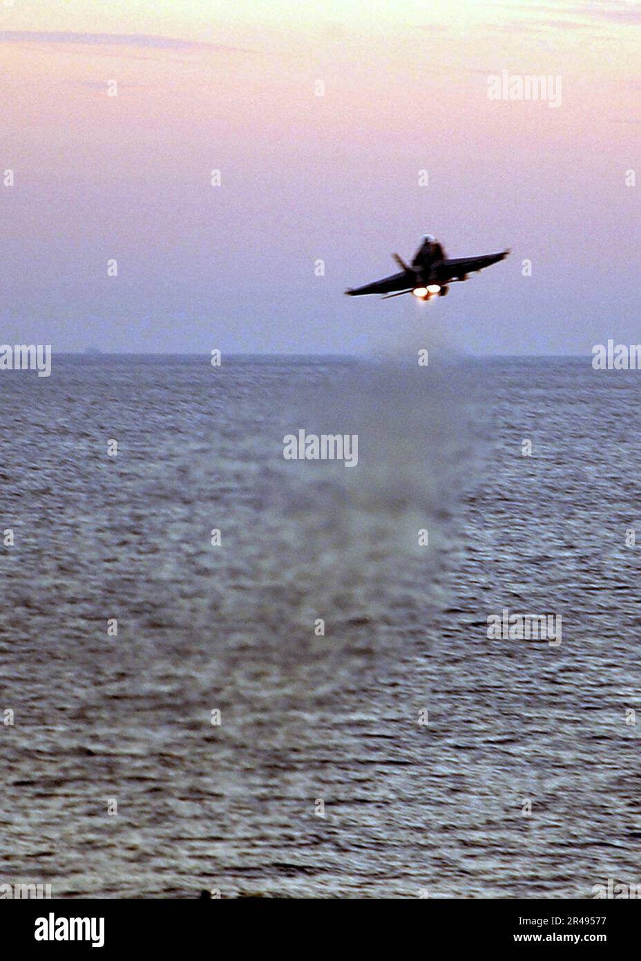 US Navy An F-A-18 Hornet launches from the flight deck aboard the ...