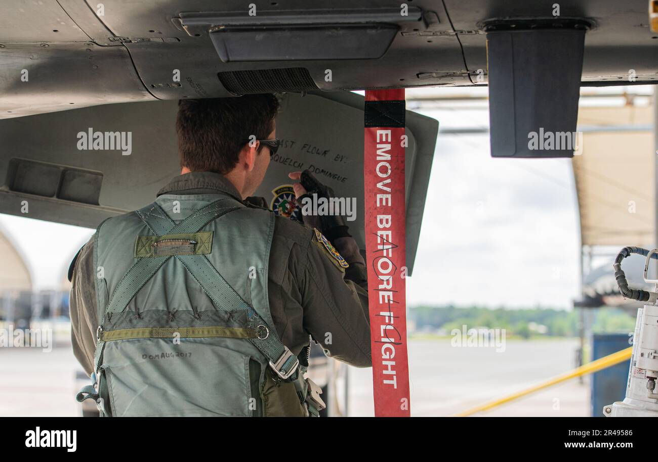 U.S. Air Force Capt. Kevin Domingue, 74th Fighter Squadron pilot, signs ...