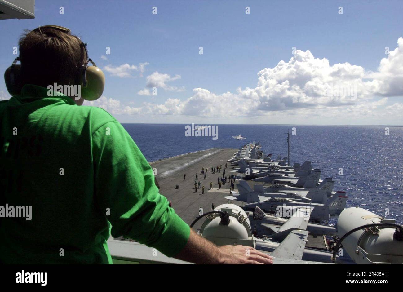 US Navy A Shared Air Reconnaissance Pod (SHARP) technician views flight ...