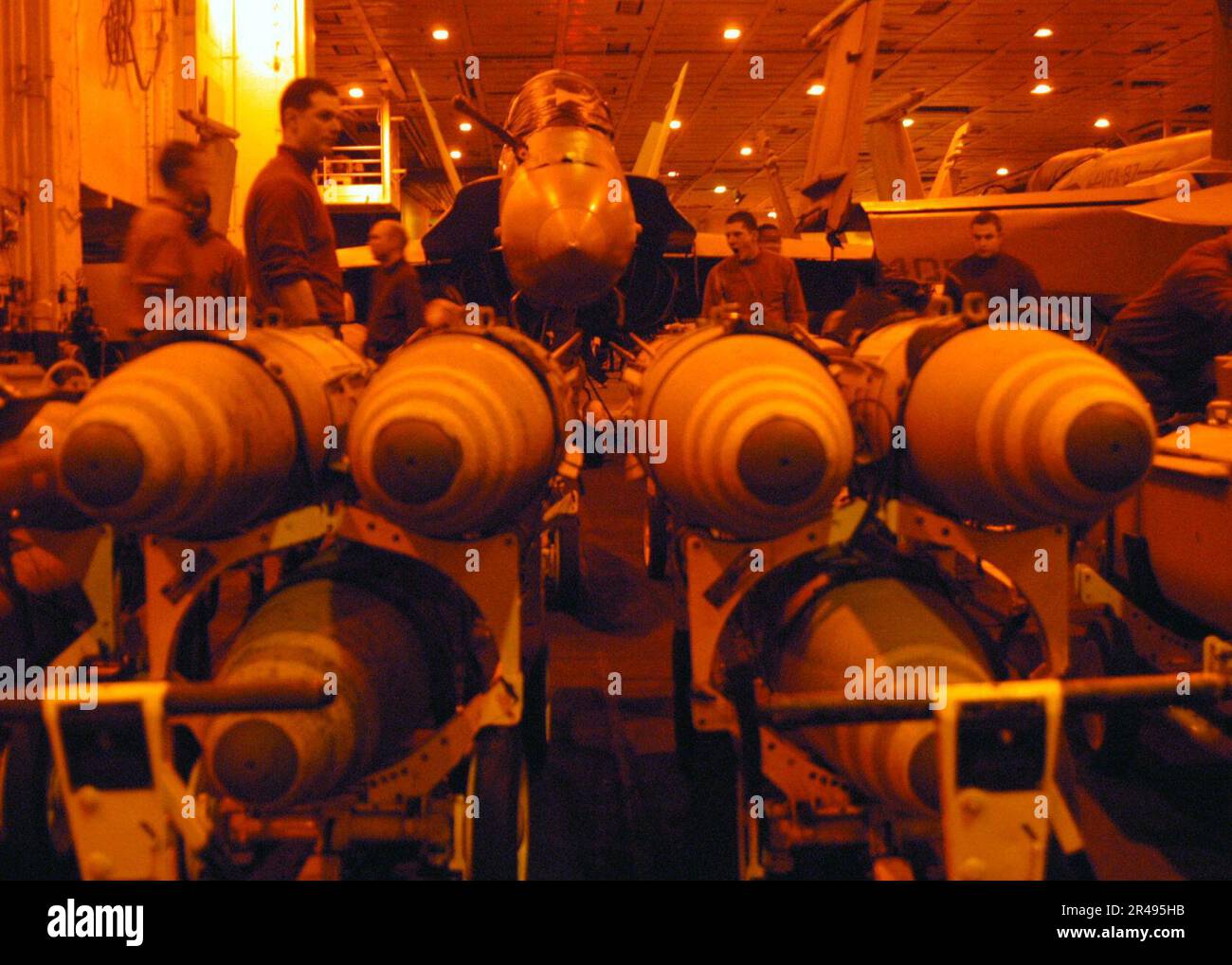 US Navy Ordnance is stacked and ready for transfer up to the flight ...
