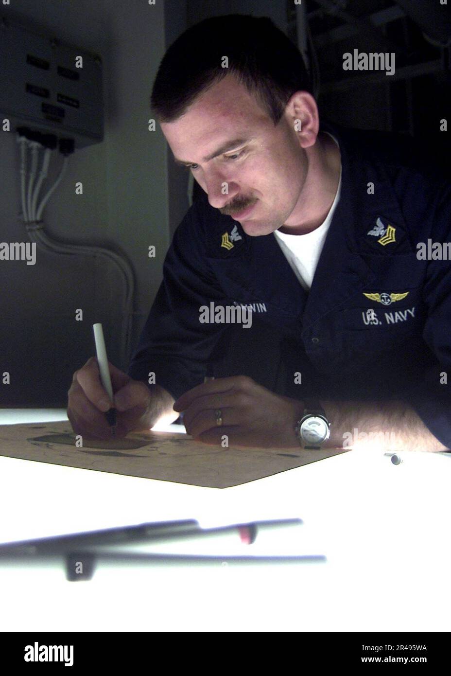 US Navy Illustrator Draftsman 1st Class creates a logo on his ...