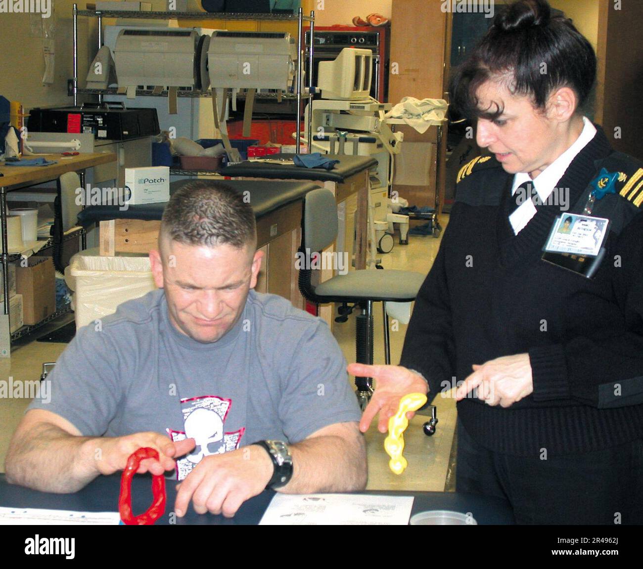 US Navy In the Occupational Therapy (OT) outpatient clinic, Marine Sgt ...