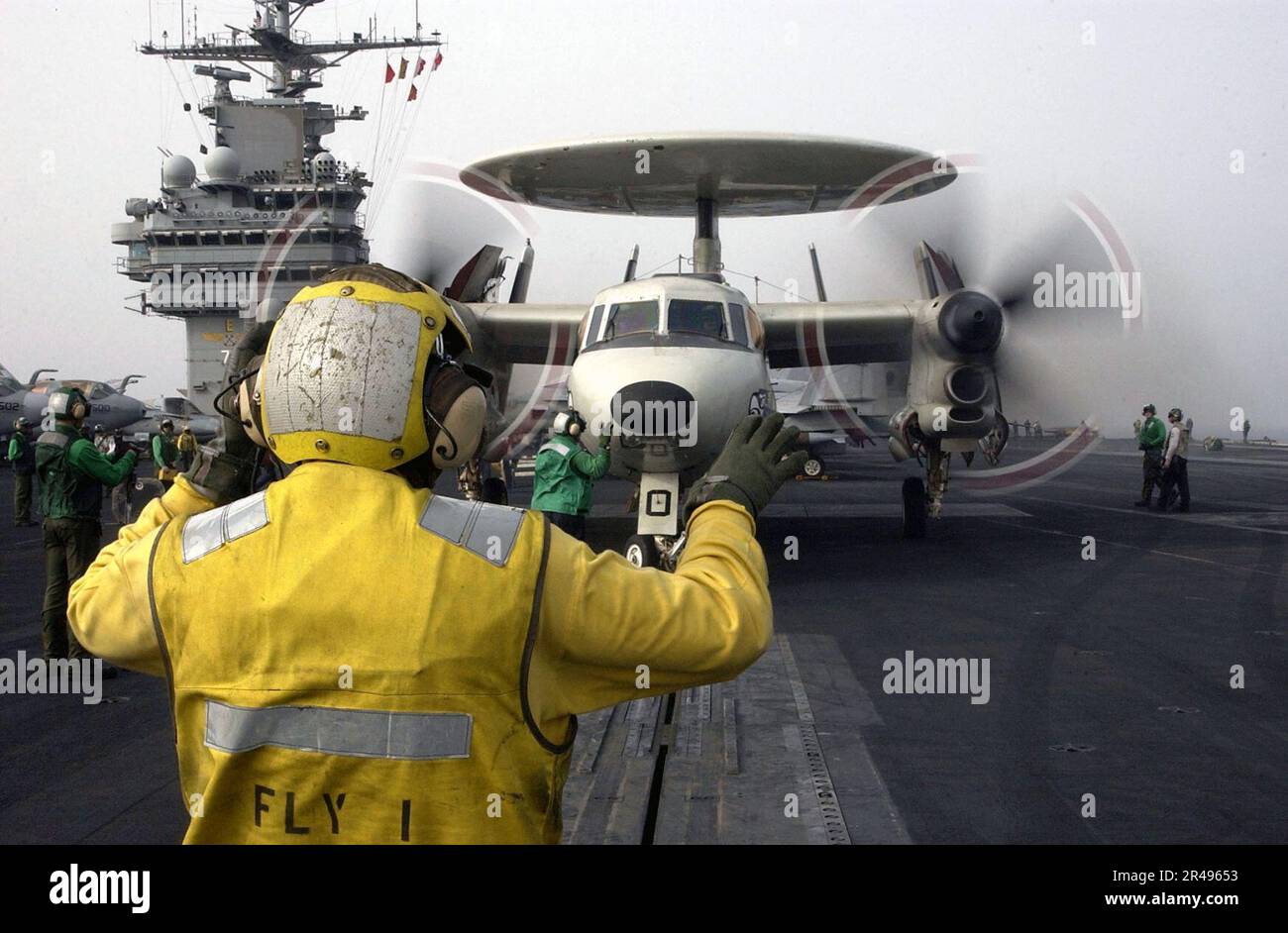 US Navy An E2-C Hawkeye prepares to launch from the flight deck aboard ...